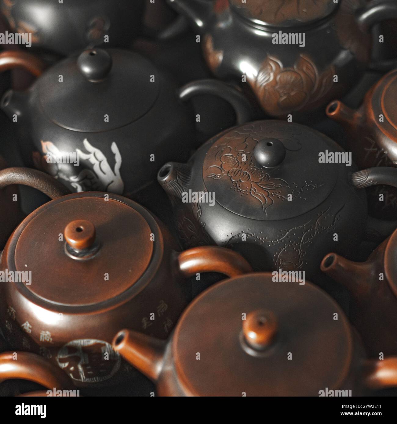 An exquisite and captivating display of various traditional teapots ...