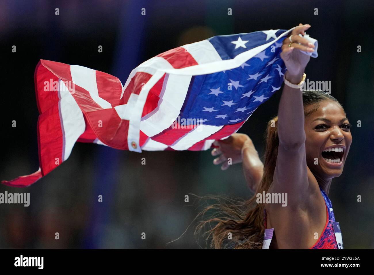 Gabrielle Thomas, of the United States, celebrates winning the gold ...