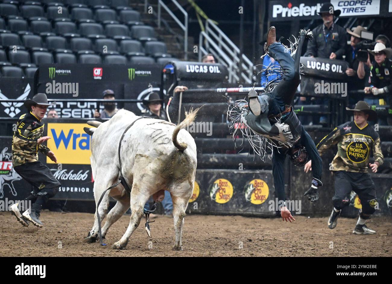 ST. LOUIS, MO - DECEMBER 08: Bullrider Marco Rizzo loses his grip on ...