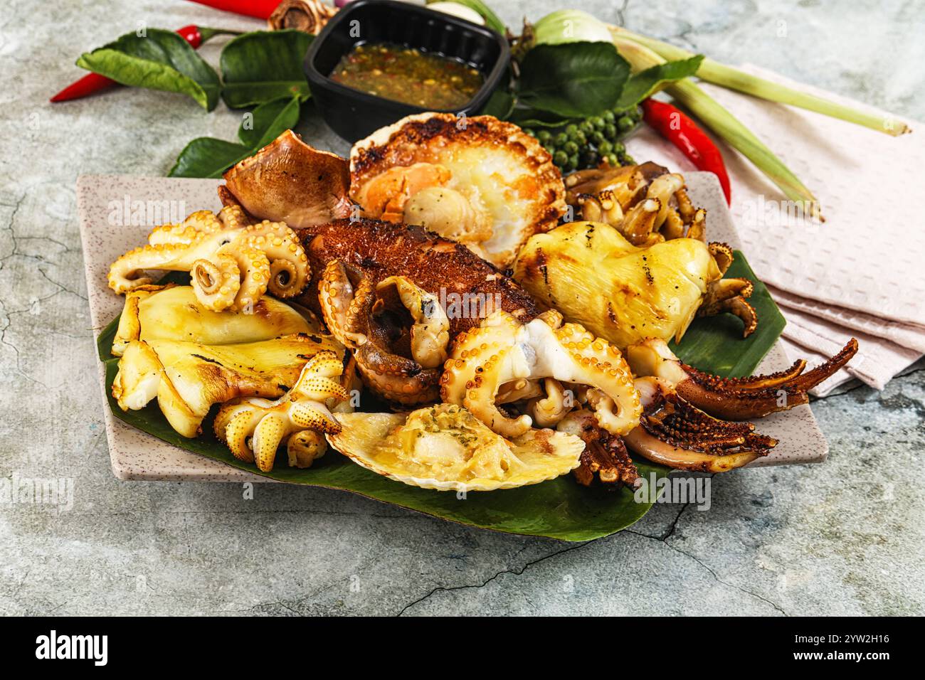 Asian grilled seafood mix plate - squid, cuttlefish, scallops and ...