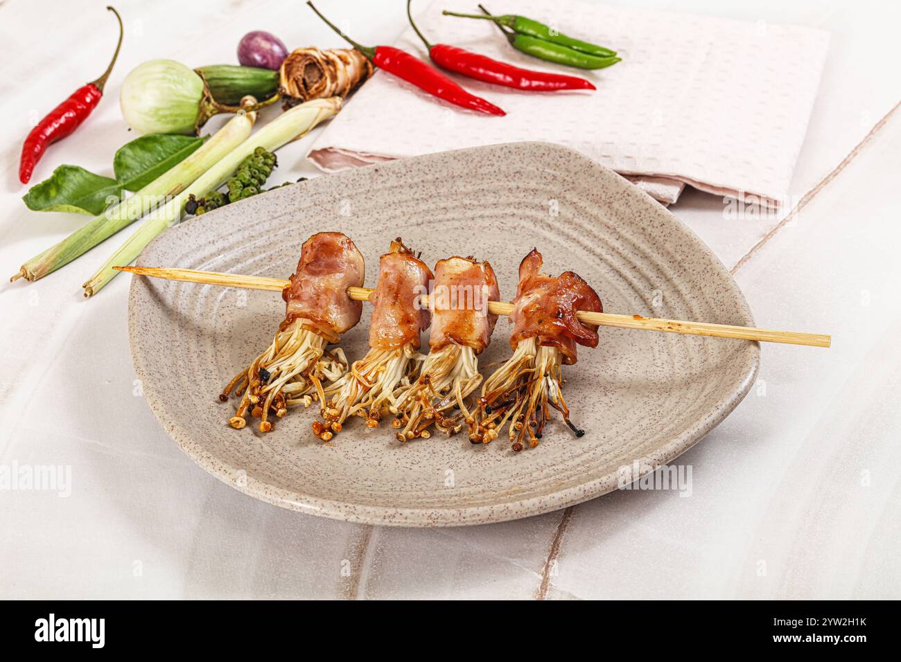 Thai Street foof satay with bacon and mushroom enoki skewer Stock Photo ...