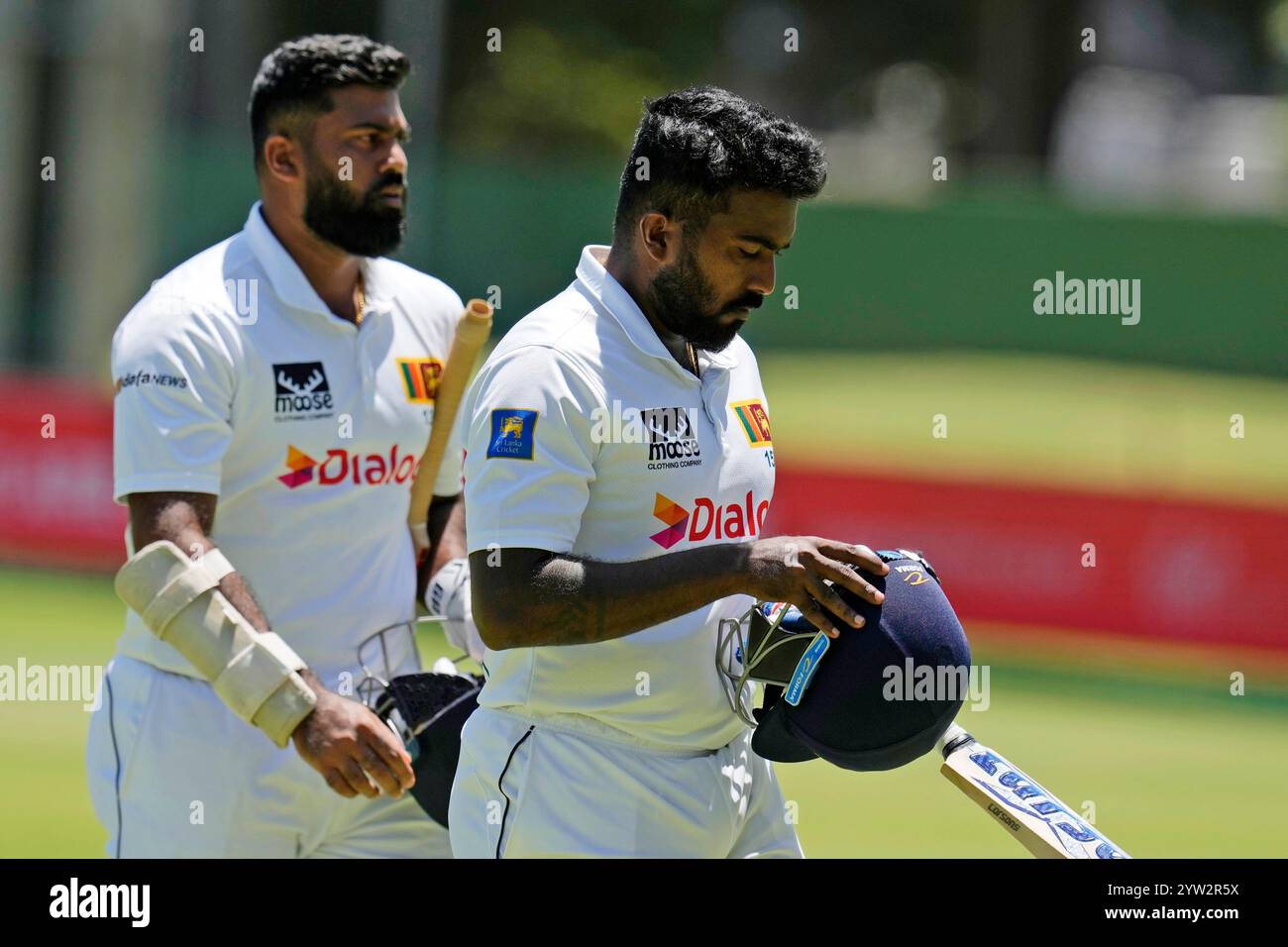 Sri Lanka's Asitha Fernando, right, with teammate Lahiru Kumara leave ...