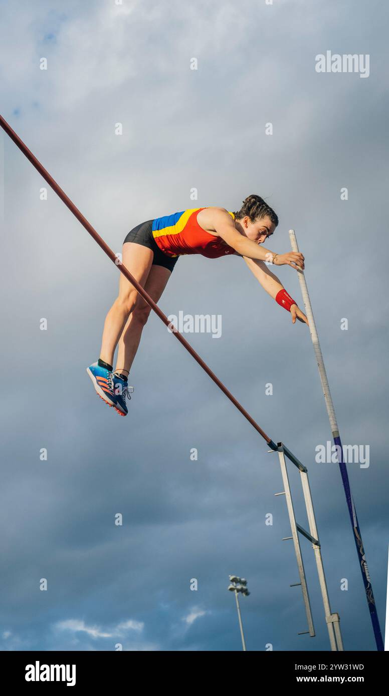 Female high jump over bar hi-res stock photography and images - Alamy