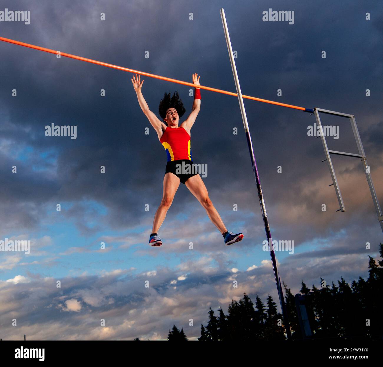 Pole vaulter mid air hi-res stock photography and images - Alamy