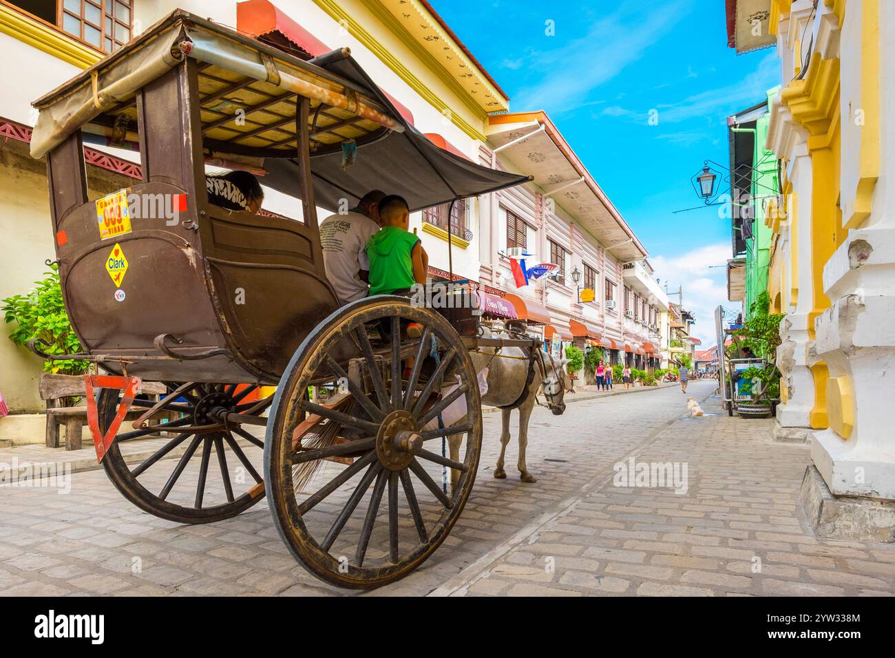 Horse-drawn Kalesa carriage on Calle Crisologo, Vigan City, Philippines ...
