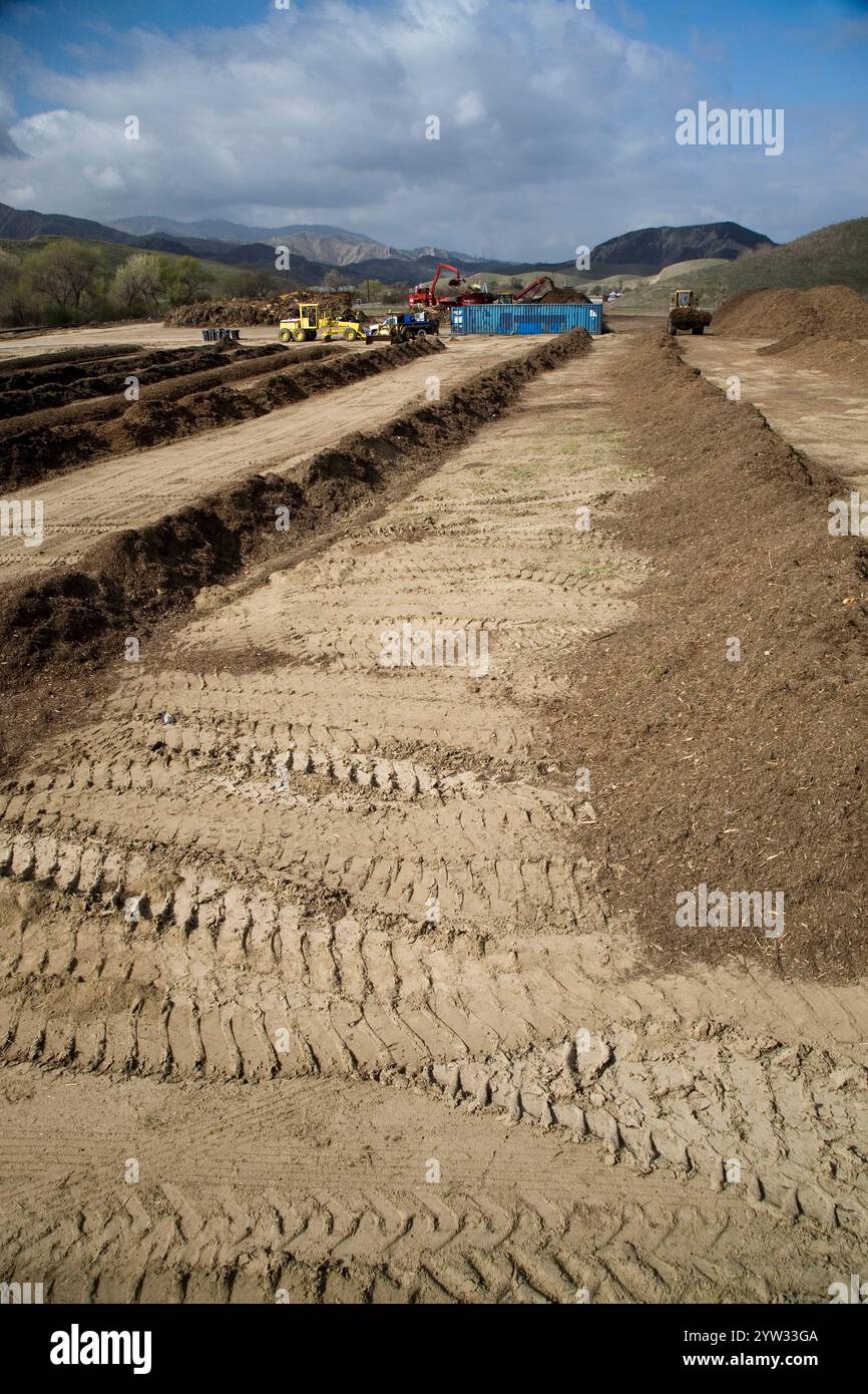 Composting yard waste to make mulch Stock Photo - Alamy