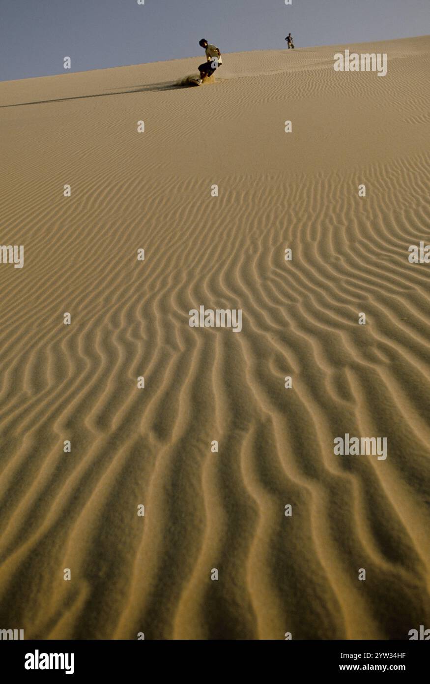 Two local sandboarders in the Ica Desert, Peru Stock Photo - Alamy