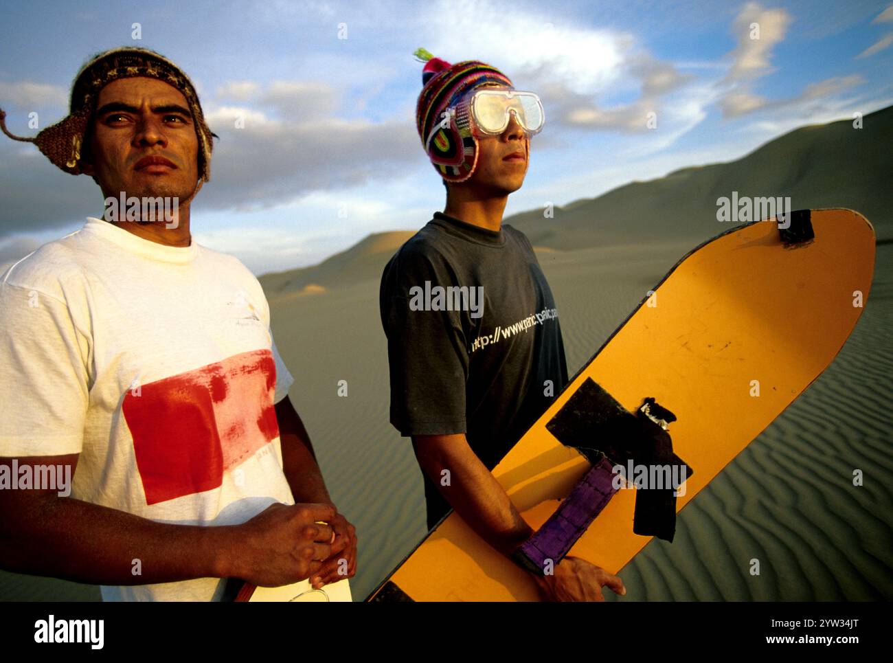 Two local sandboarders in the Ica Desert, Peru Stock Photo - Alamy