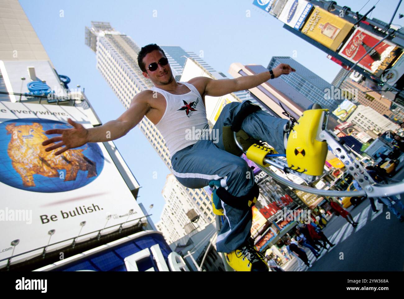 A performer presenting his new bouncing shoes on Broadway avenue, New ...