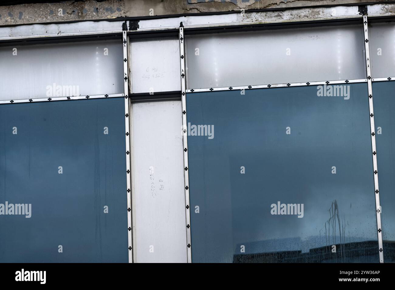 Parts of a decaying old industrial building Stock Photo - Alamy