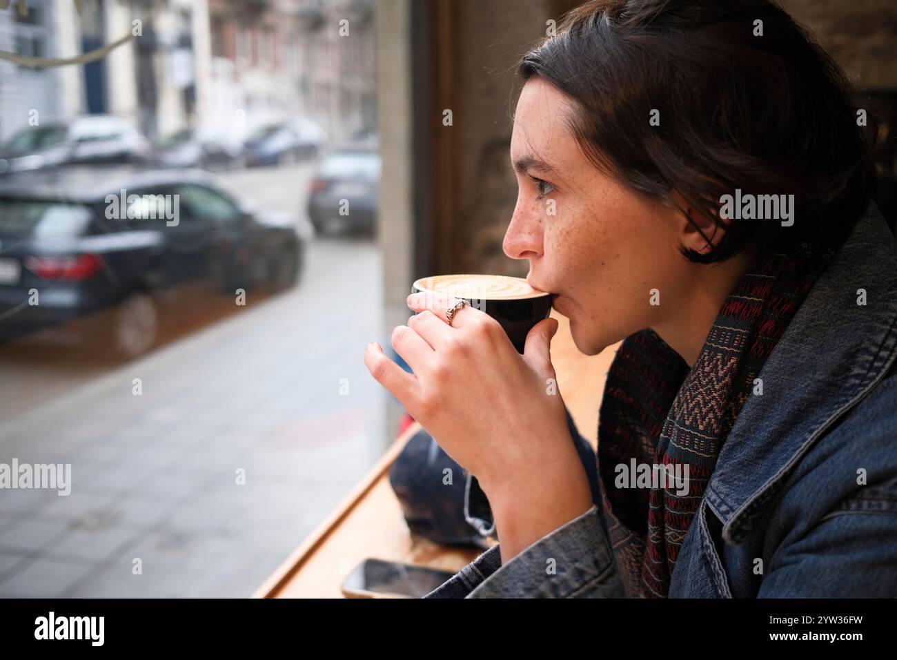 Woman sipping hi-res stock photography and images - Alamy