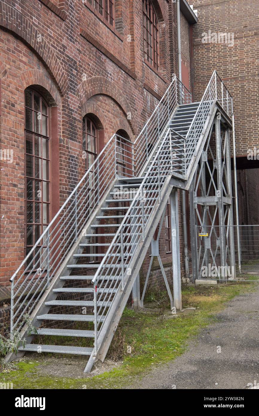 Outdoor metal stairway to a brick building Stock Photo - Alamy
