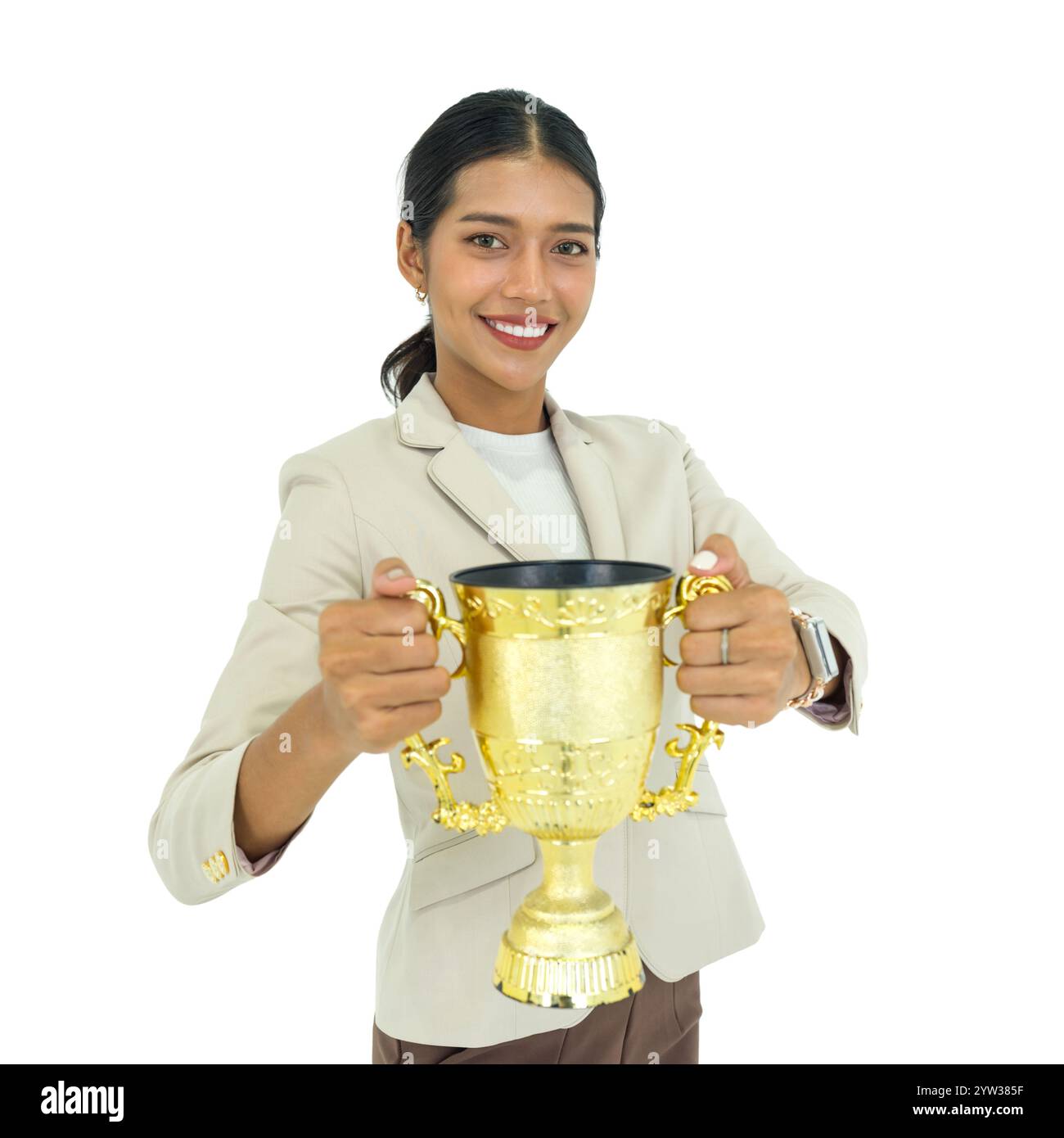 Successful asian businesswoman holding a prestigious trophy ...