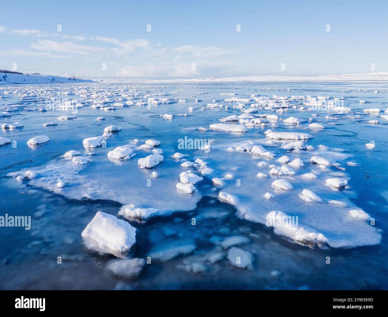 Frozen Arctic landscape with drifting ice and a clear blue sky u Stock Photo - Alamy