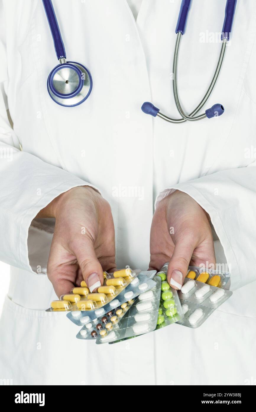 A doctor shows various packs of tablets, tablet addiction, medication ...