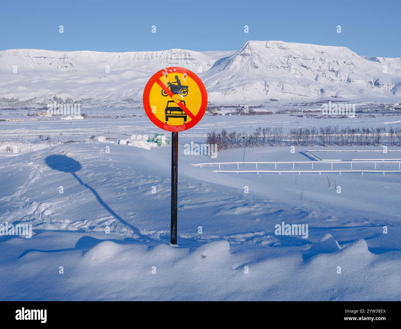 No heavy machinery warning sign in snowy landscape Stock Photo - Alamy