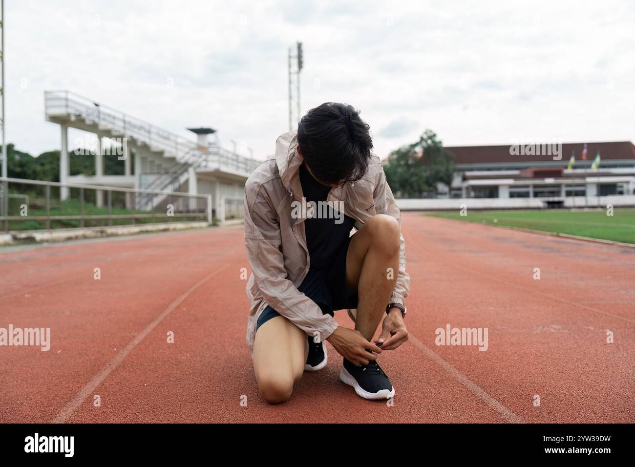 Athlete preparing for race sports track action outdoor environment ...