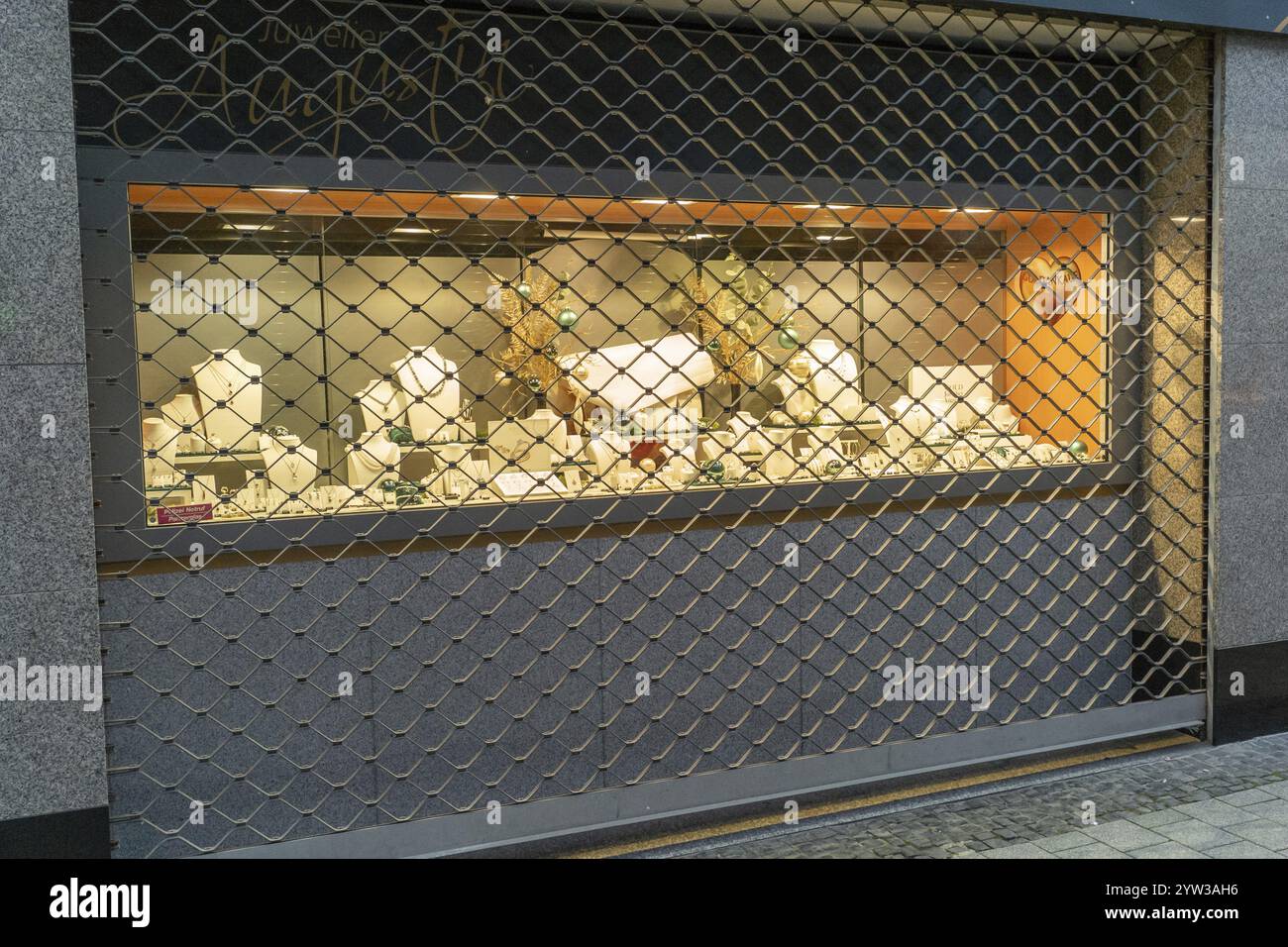 Barred shop window of a watch shop Stock Photo - Alamy