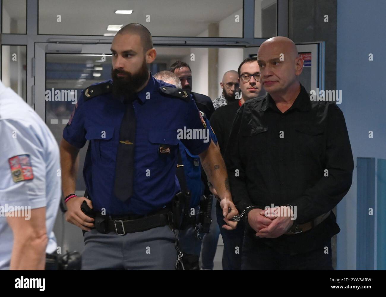 Olomouc, Czech Republic. 09th Dec, 2024. Defendants (R-L) Jiri Adam ...