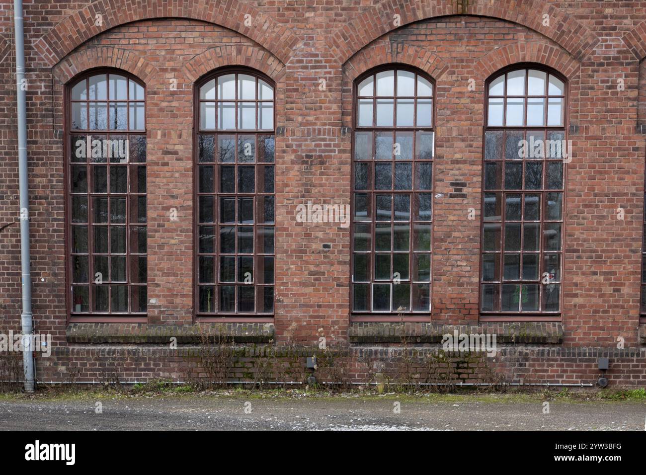 Details of 100 years old industrieal buildings, windows Stock Photo - Alamy