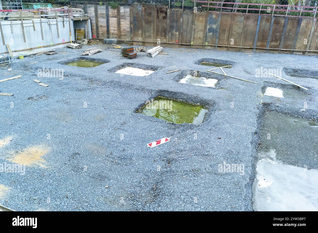 Building pit for a house in the rain Stock Photo - Alamy