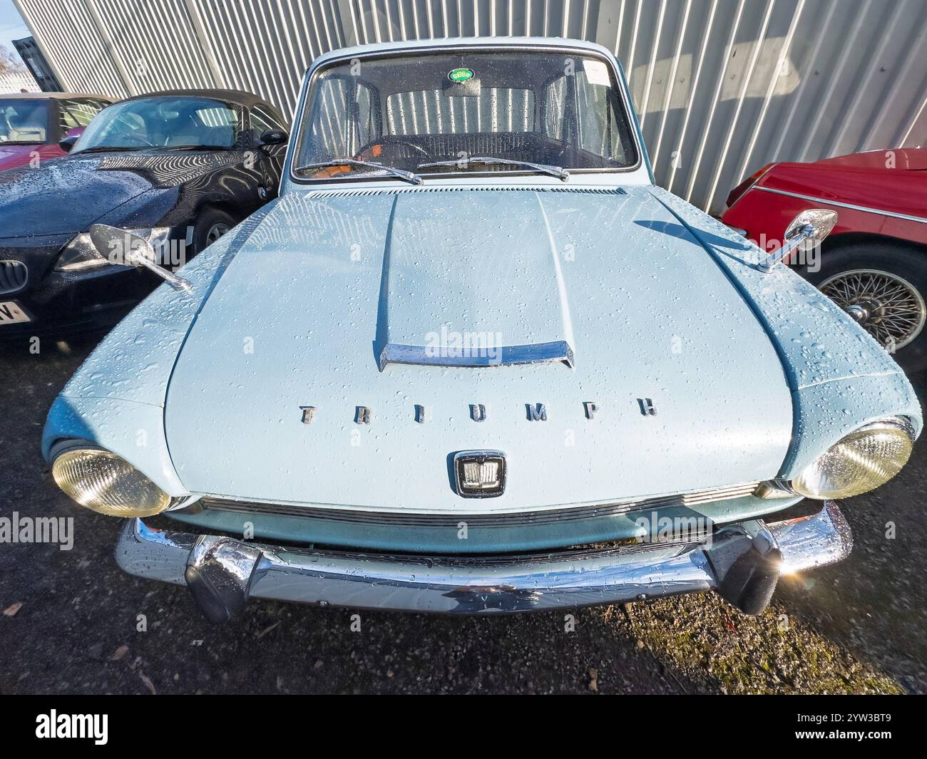 wide angle Close-up of light blue 1960s vintage Triumph 1300 bonnet ...