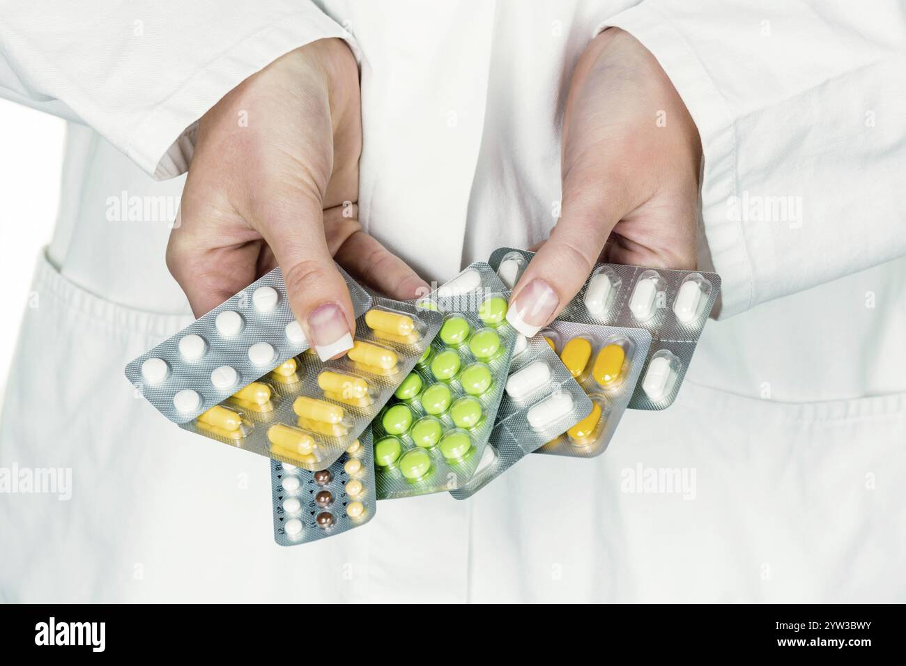 A doctor shows various packs of tablets, tablet addiction, medication ...