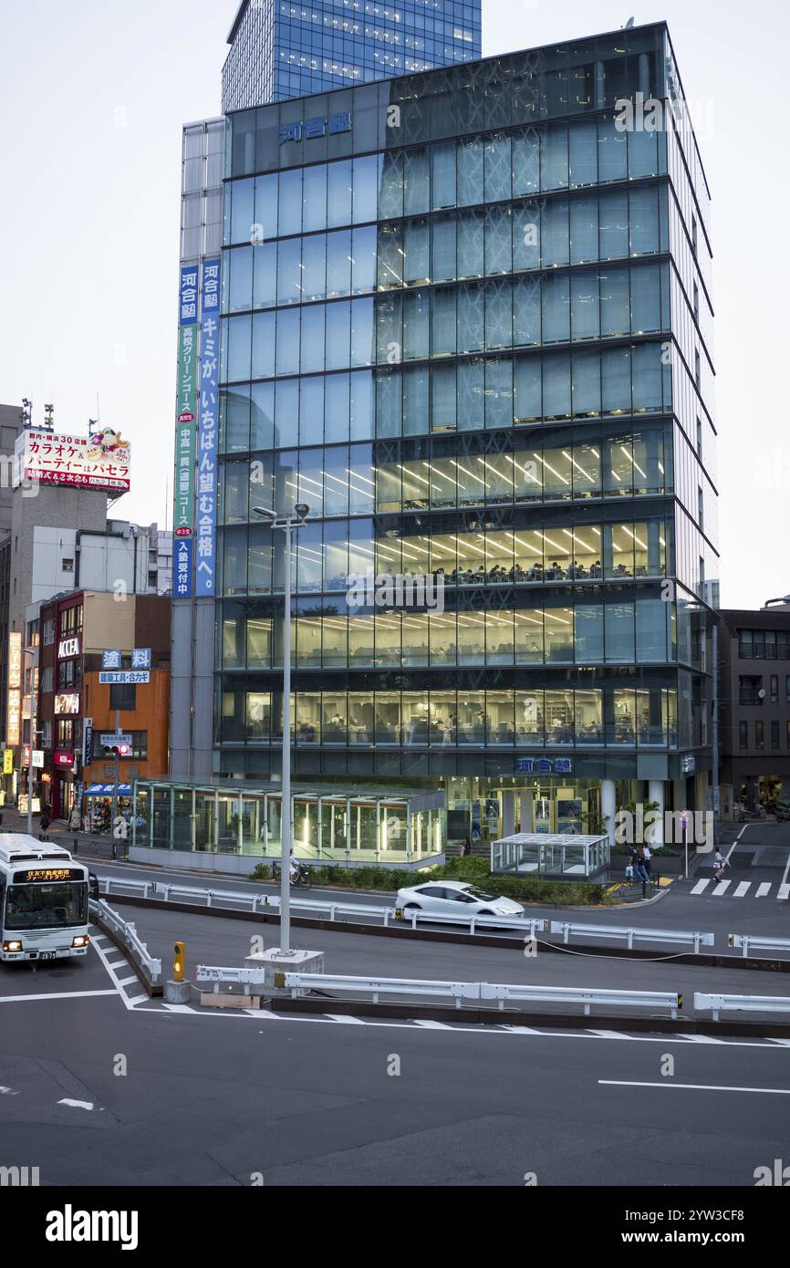 Office worker at the end of the day, high-rise building, Tokyo, Japan ...