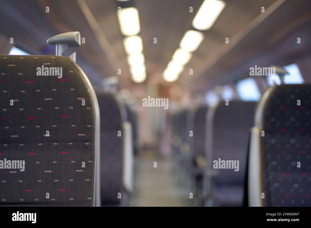 Empty train seats with a blurred background of the train interior Stock ...