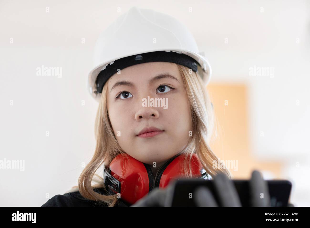 Focused young asian female hi-res stock photography and images - Alamy