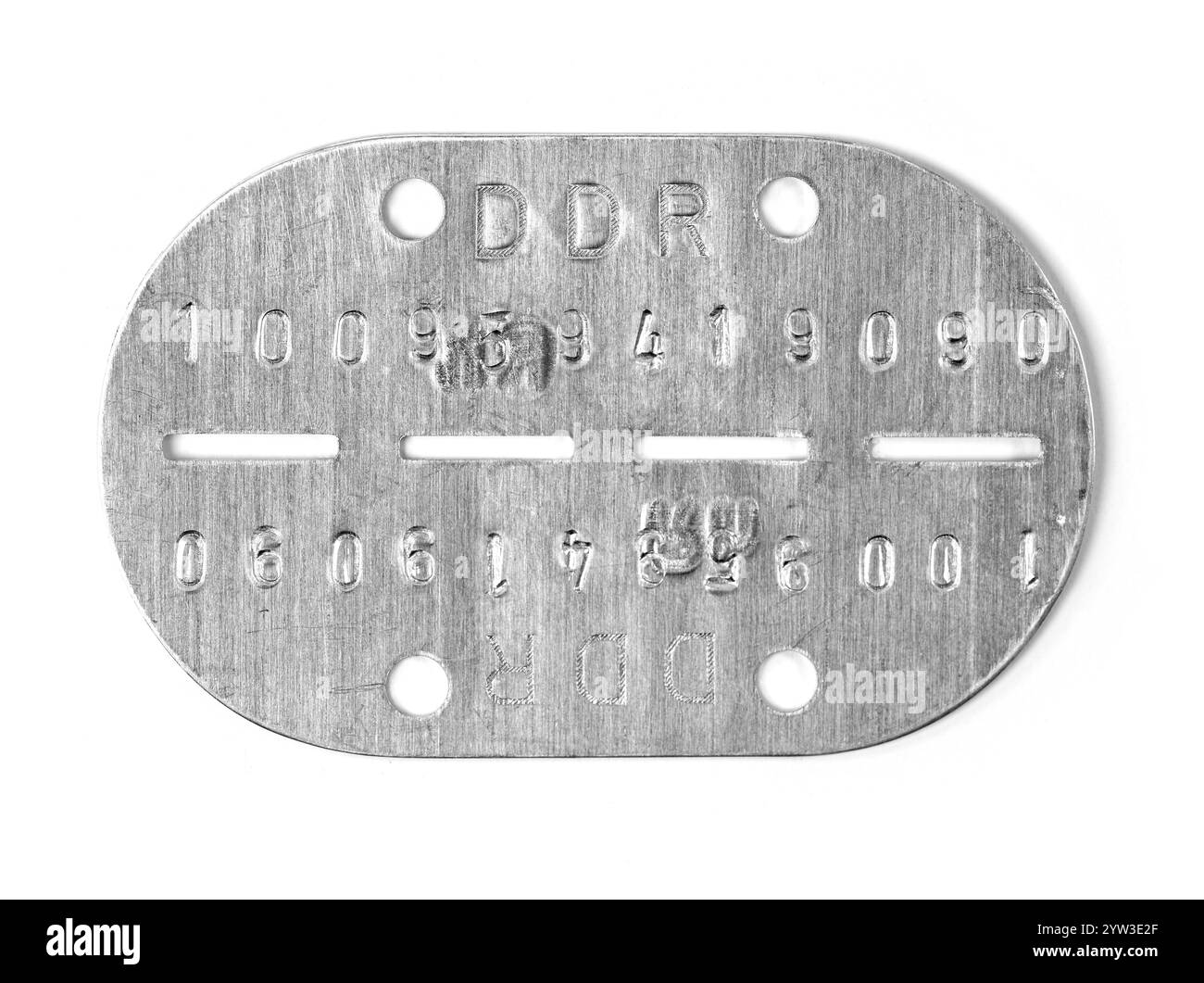 Identification badge of the NVA in the GDR against a white background ...