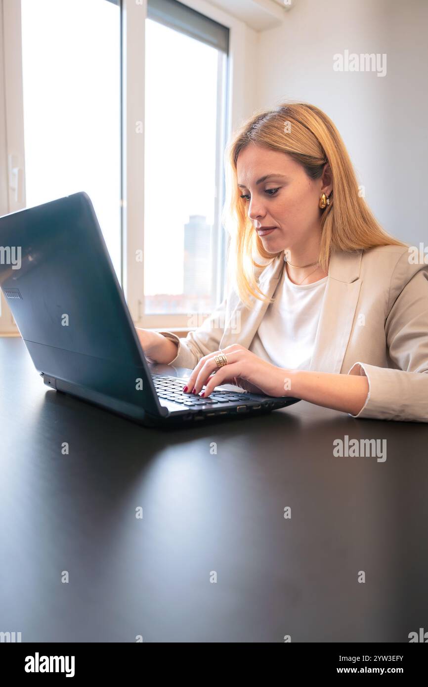Office woman professional laptop hi-res stock photography and images ...