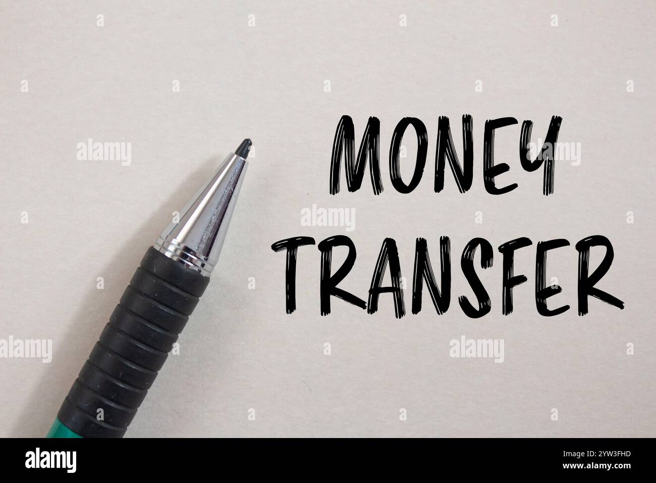 Money transfer message written on white paper with a pen. Conceptual ...