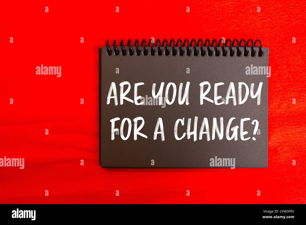 Are you ready for a change message written on black notebook page with ...