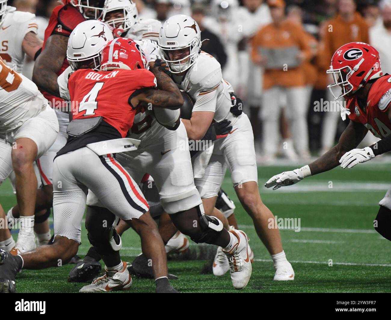 ATLANTA, GA - DECEMBER 07: Texas Longhorns quarterback Arch Manning (16) rushes the ball during ...