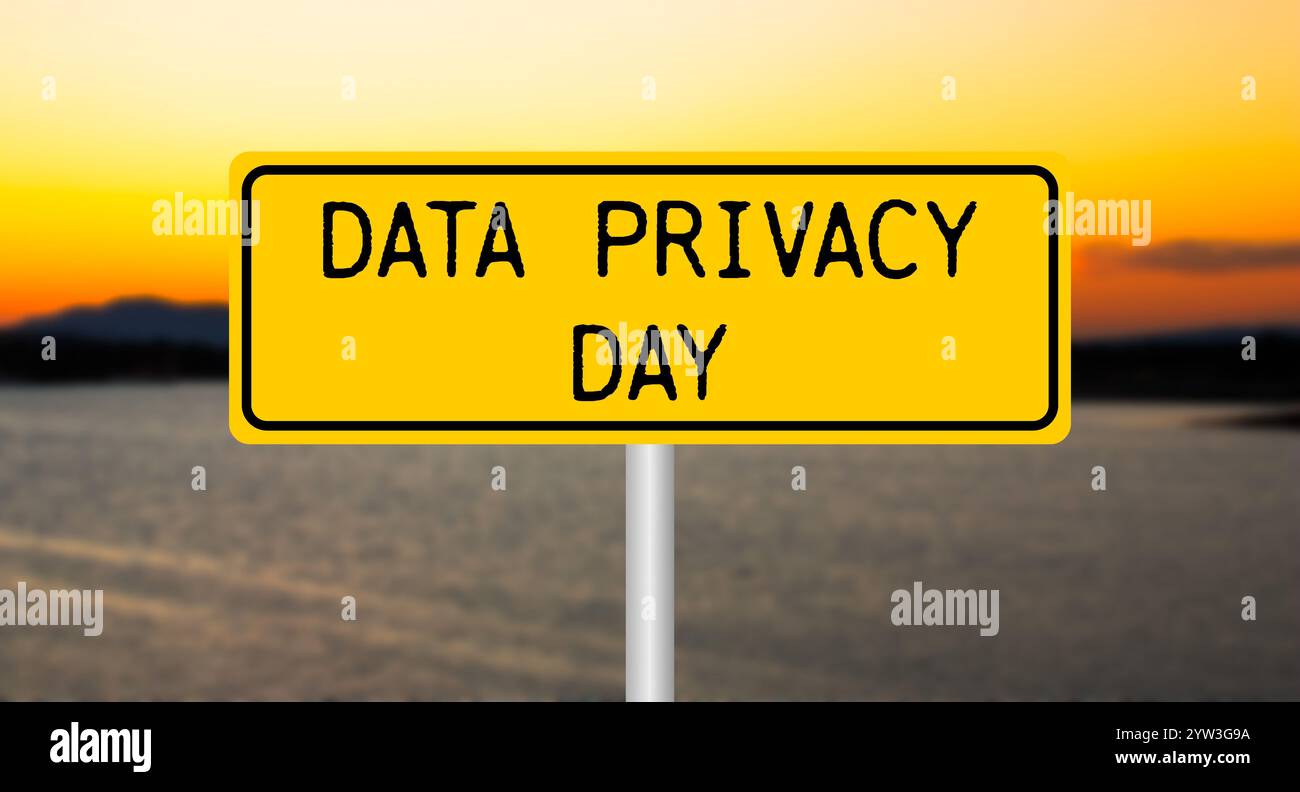 Data privacy day message written on yellow sign with blurry lake ...