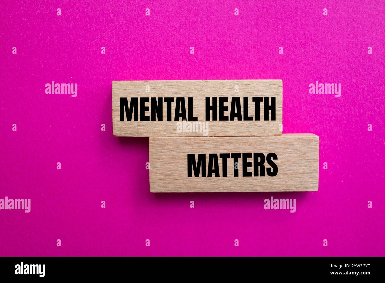 Mental health matters message written on wooden blocks with pink ...