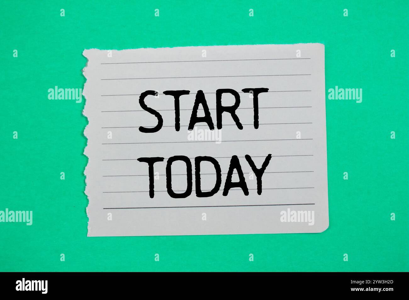 Start today message written on ripped torn paper piece with green background. Conceptual start ...