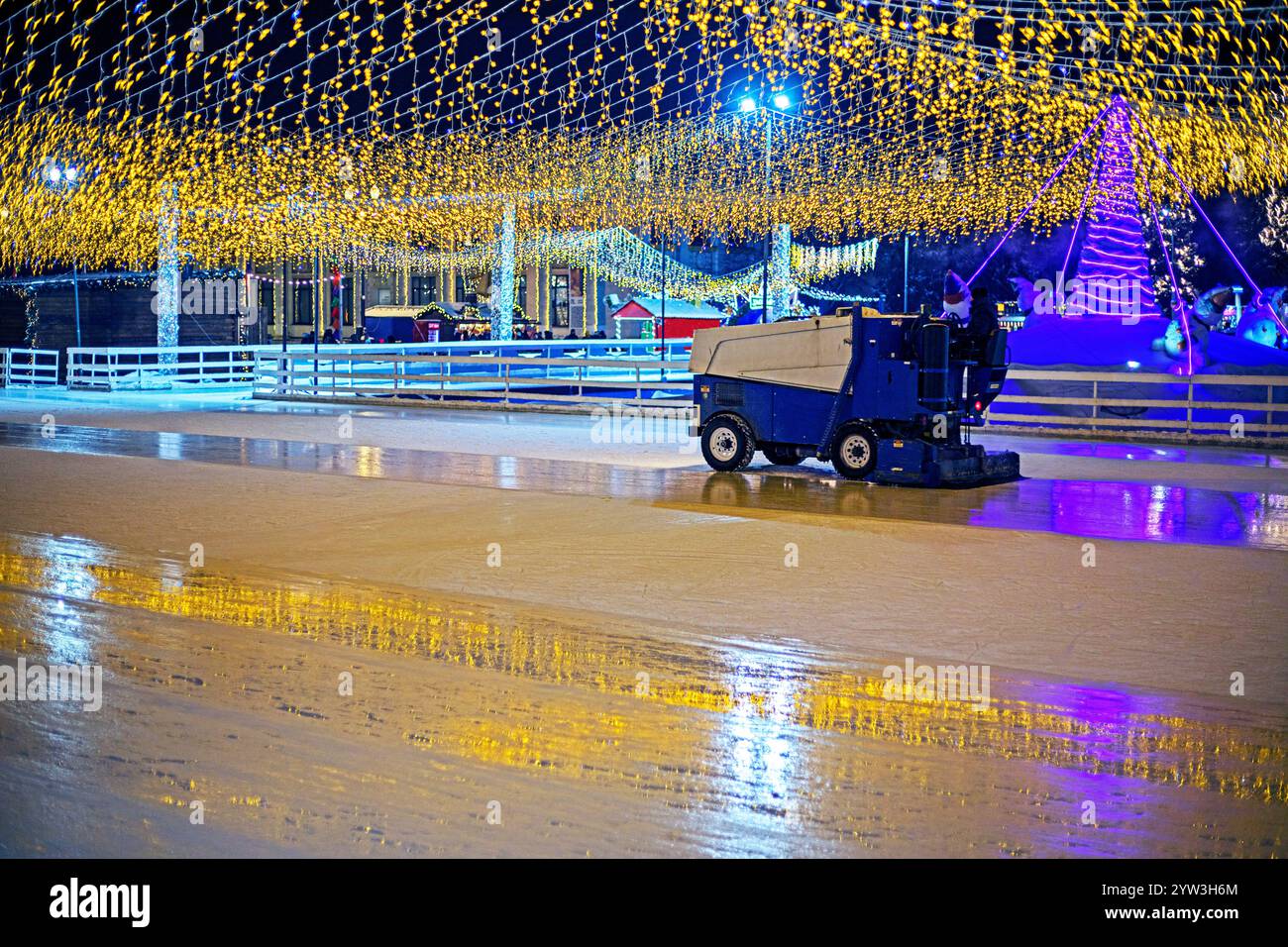special machine on the figure skating rink polishes the ice after ...