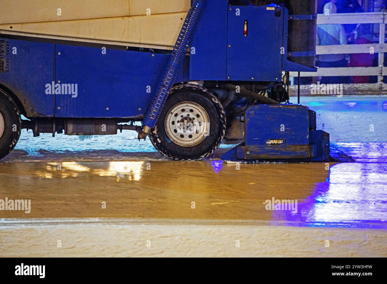 special machine on the figure skating rink polishes the ice after ...