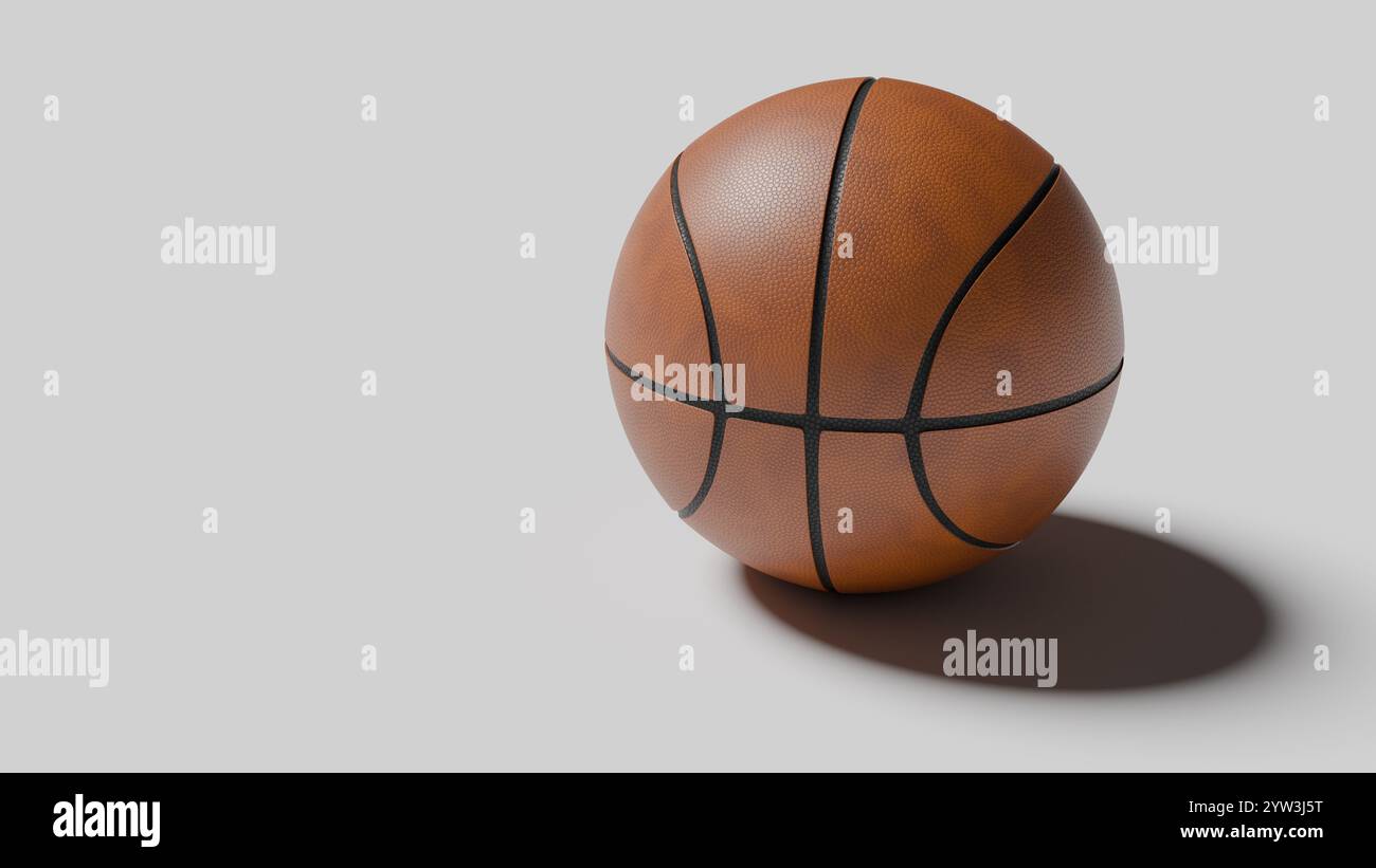 basketball sits on a smooth surface, casting a soft shadow. Its ...
