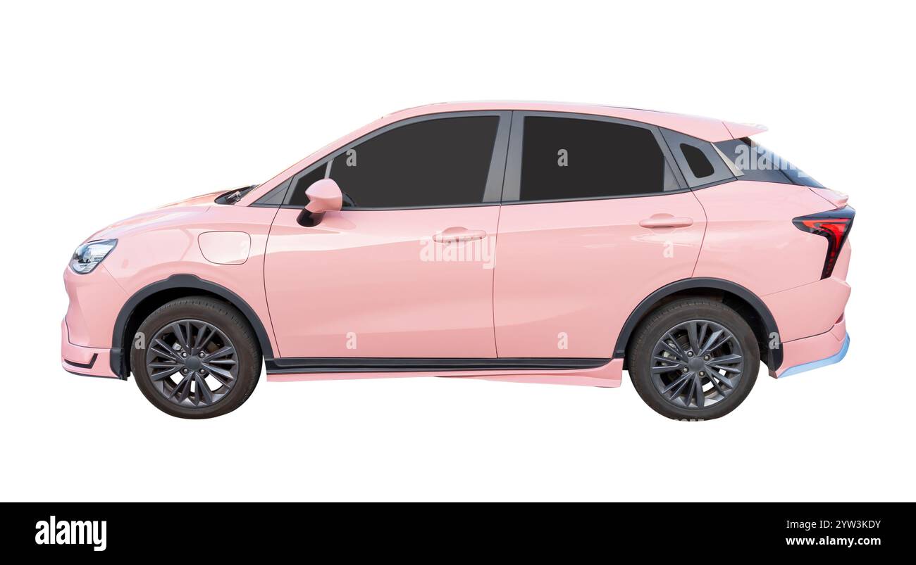 Side view of pink mini or small electric hatchback car is isolated on ...