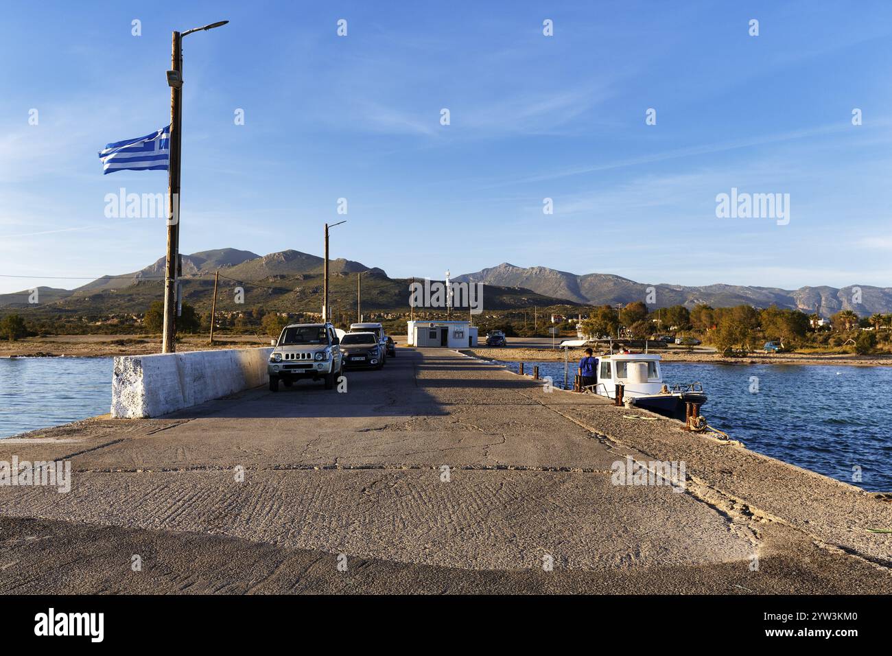Jetty with Greek flag, Pounta ferry pier for the ferries to Elafonisos ...