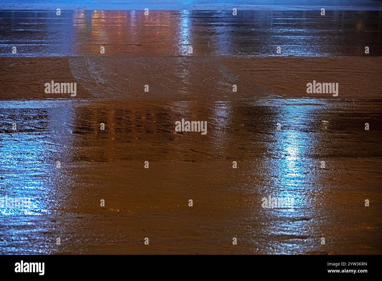 abstract background of shiny polished ice on a winter figure skating ...