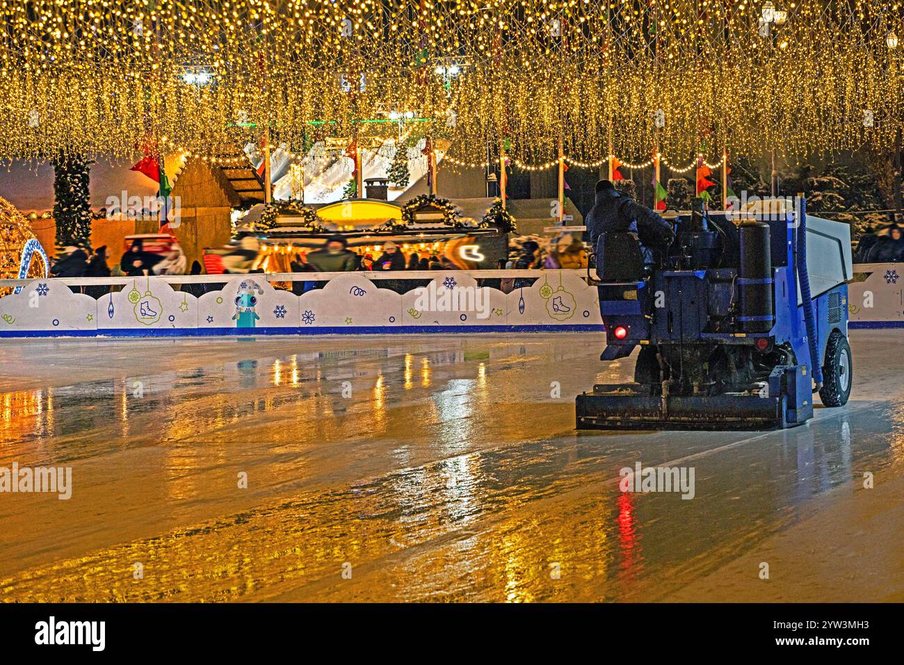 special machine on figure skating rink polishes ice before skating ...