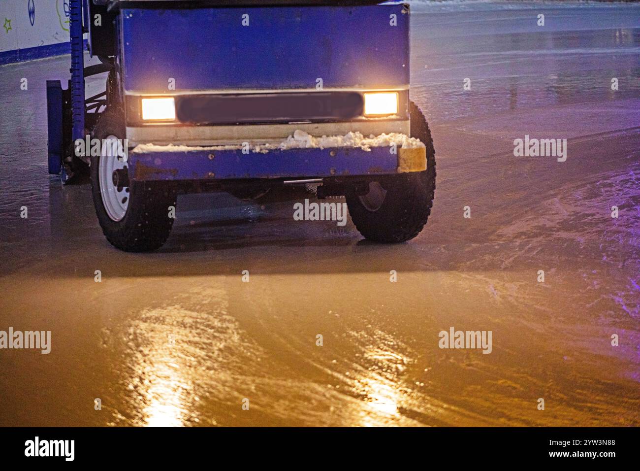 special ice polishing machine at figure skating rink polishes ice ...