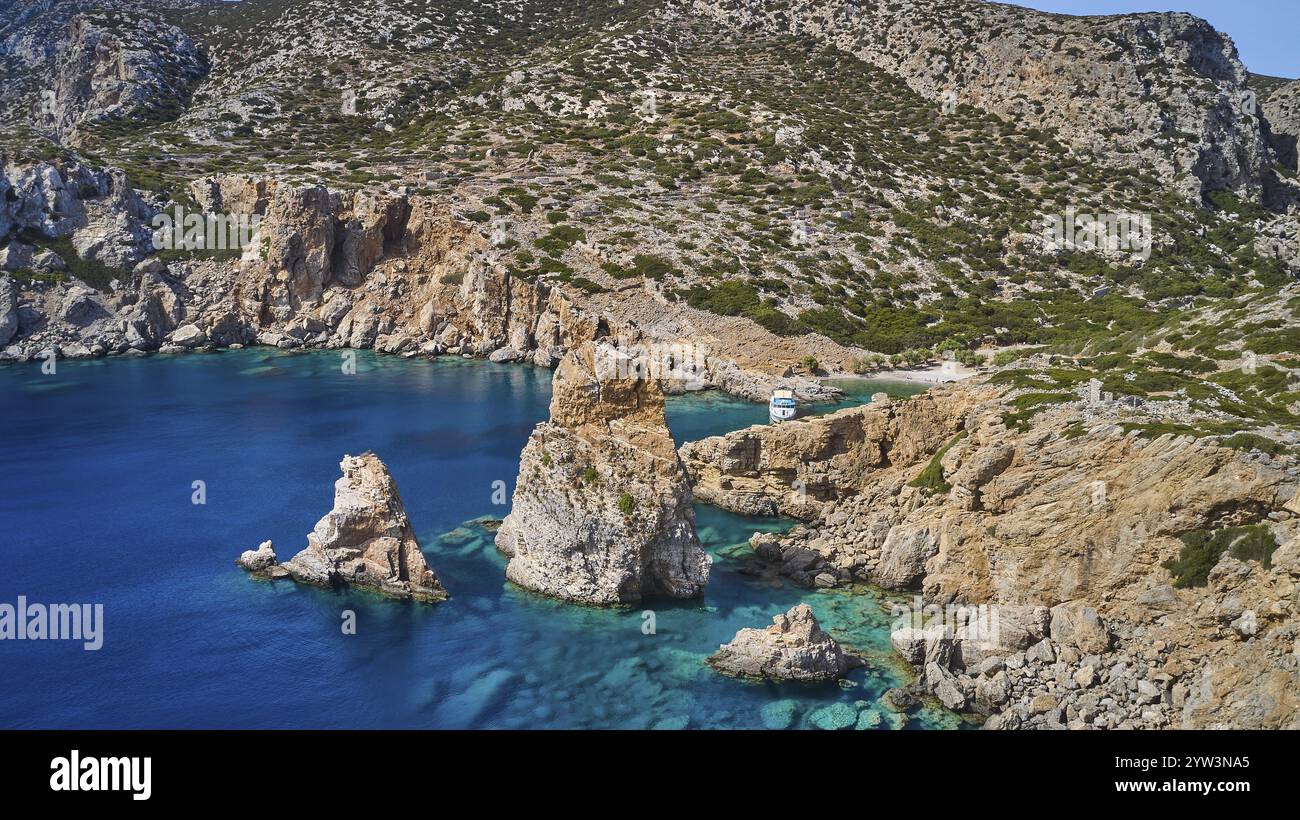 Palatia Beach, Palatia, bay surrounded by cliffs with offshore rock ...