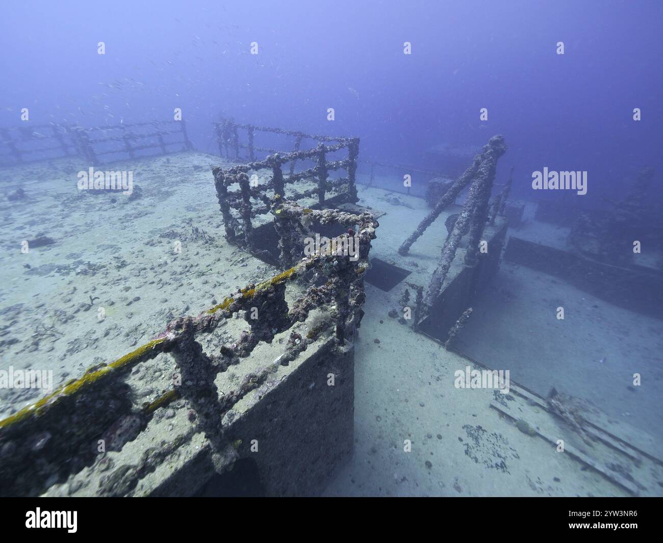 Deck and steel stairs of an abandoned shipwreck under water, dive site ...
