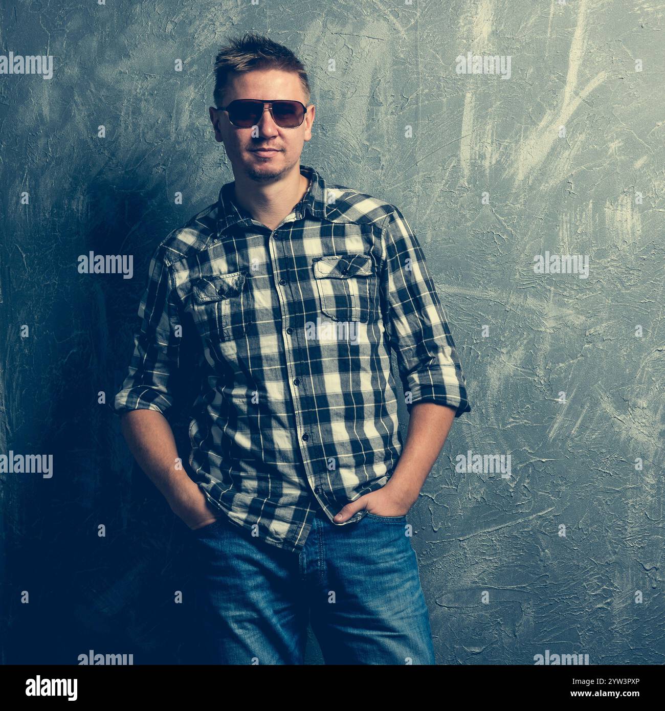 Man in a plaid shirt hi-res stock photography and images - Alamy