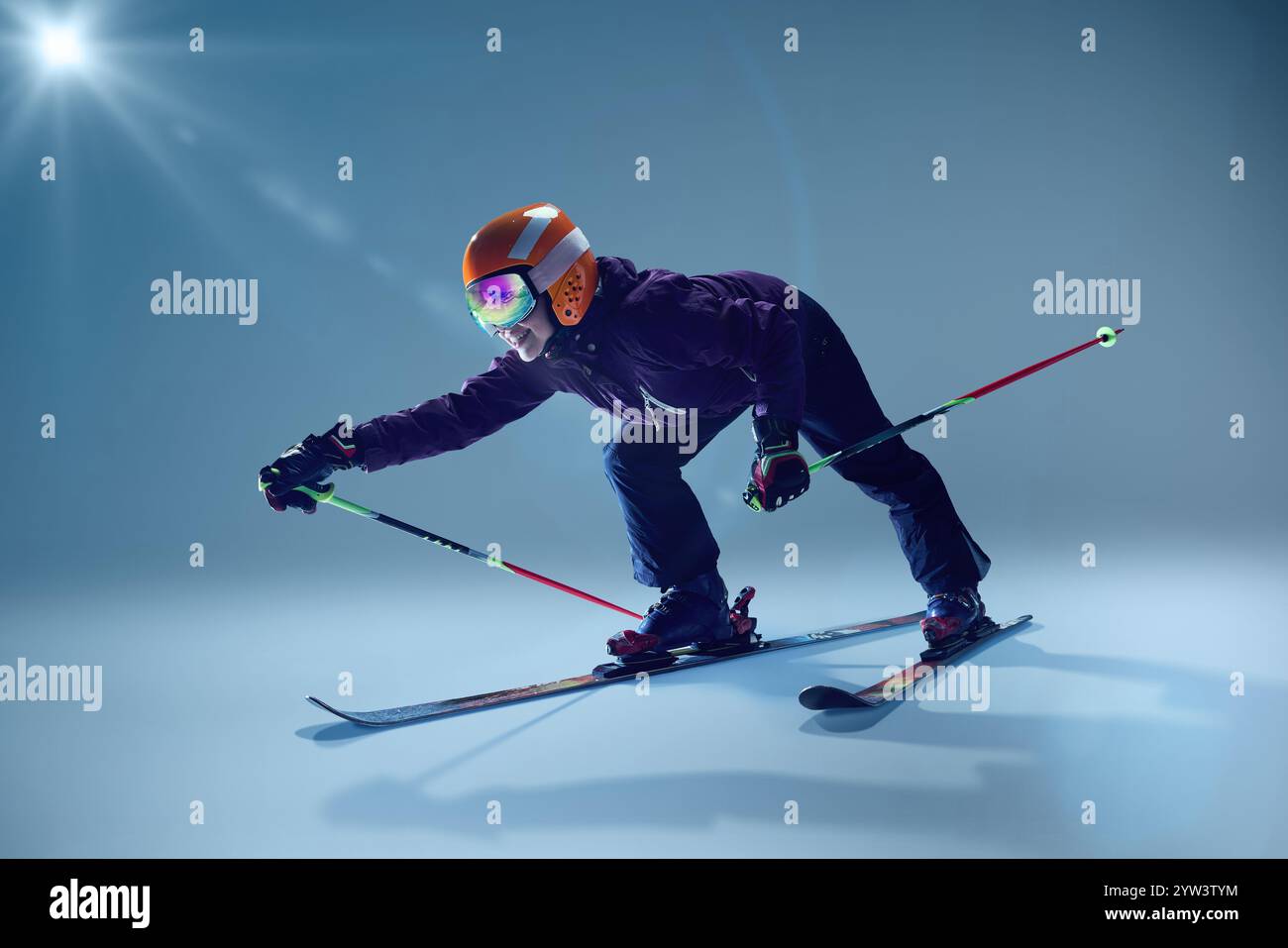 Controlled carve of skier showcases agility, as glide smoothly across ...